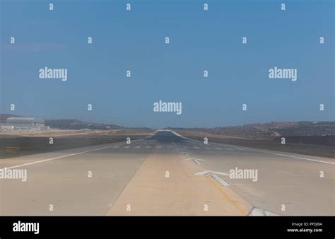 Ready For Takeoff Empty Airport Runway Against Sky Horizon Background View From Plane Window