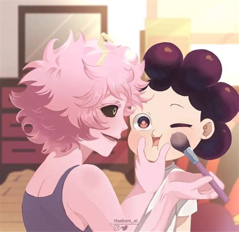 A Woman With Pink Hair Brushes Her Face In Front Of Another Womans Face