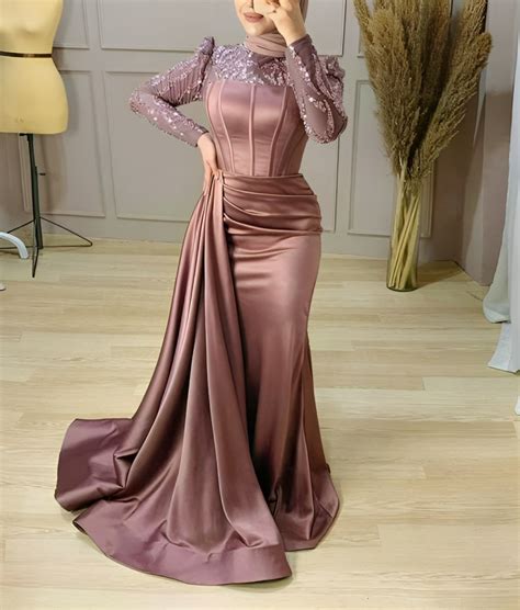 صور أجمل فساتين سواريه بسيطه وشيك للمحجبات 2026 مجلة زينة
