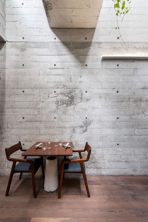 Greenery Spills Over Chunky Concrete Beams In Limas Statera Restaurant
