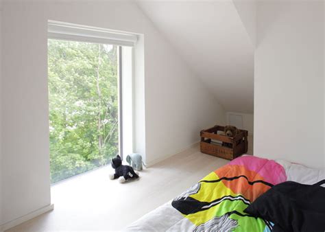 Timber House M M By Tuomas Siitonen Wraps Around A Sheltered Garden