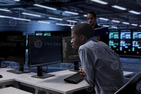 It Engineer In Server Room Facility Confused By Errors On Screen While Shielding Data From