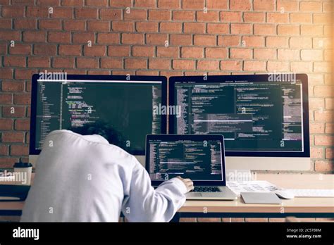 Man Programmers Are Sleeping While Working Analyzing On Desk In Code At