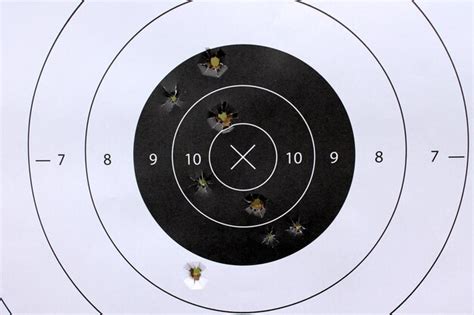 Premium Photo Close Up Of Target With Bullet Holes