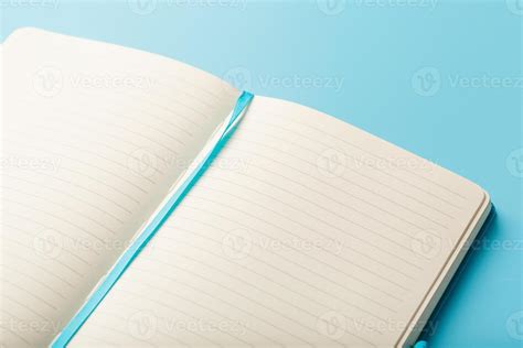 Open Notebook Diary With Blank And Blank Pages On A Blue Background Top View 14601621 Stock