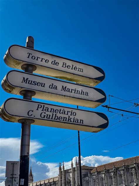 Direction Signs To Famous Landmarks In Lisbon Under Blue Sky Stock Image Image Of Planetário