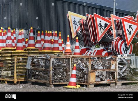 Traffic Cones Or Pylons And Signs For Road Construction Sites On An