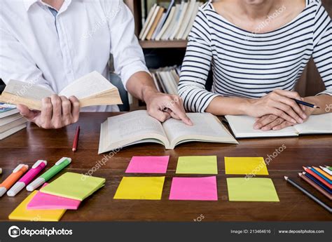 Education Teaching Learning Concept Two High School Students Classmates