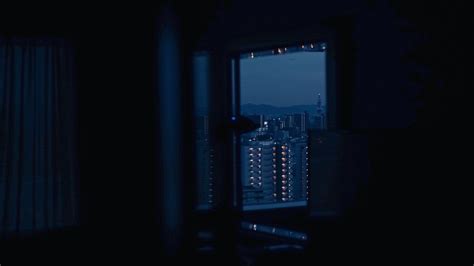 City Lights Through An Open Window