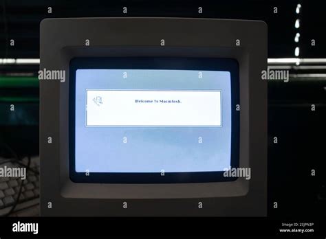 Vintage Macintosh Mac Classic Computer Screen Displaying The Welcome To Macintosh Message In