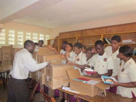 Distribution Of Books At College Canado Haitien Fondation Lucienne