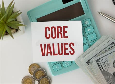 Core Values Text In Notepad In A Folder Near A Yellow Notepad With Calculator Stock Image