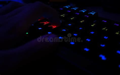 Wasd Gaming Keyboard Rgb Lighting Many Colors With Game In Background
