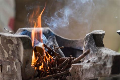 Premium Photo Close Up Of Fire On Log