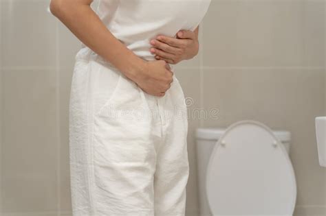 Constipation And Diarrhea In Bathroom Hurt Woman Touch Belly Stomach