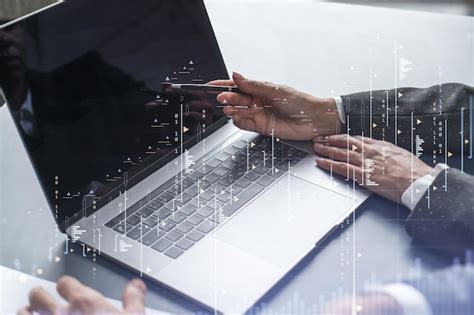 Premium Photo Two Traders Researching Historic Data To Predict Stock Market Behavior Using