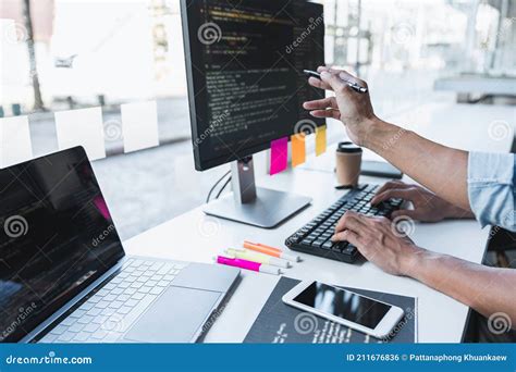writing codes and typing data code technology programmer cooperating working on web site