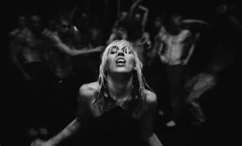 Miley Cyrus Dances Soaking Wet In Steamy New River Music Video