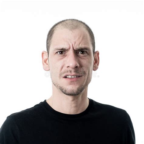 Facial Expressions And Human Emotions Portrait Of Confused Young Man