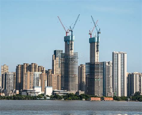 City Skyline With High Rise Buildings Under Construction And Cranes