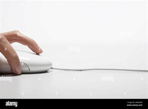 Woman S Hand On Computer Mouse Close Up Stock Photo Alamy