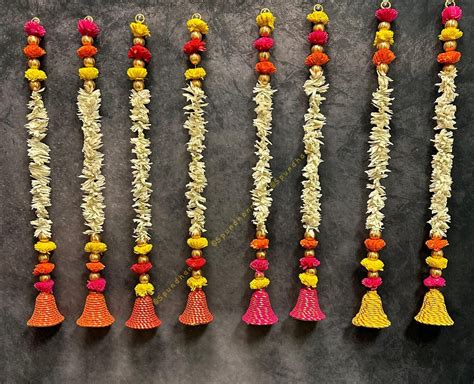 Bell With Shola Wood Marigold And Chameli String Set Of Two Spundhann