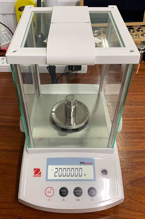 Test น้ำหนักเตรียมจัดส่งลูกค้าพรุ่งนี้ครับ เครื่องชั่งทศนิยม 4 ตำแหน่ง ยี่ห้อ Ohaus รุ่น Pr224 E