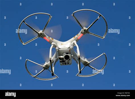 A Dji Phantom 3 Professional Quadcopter Often Referred To As A Drone With Safety Prop Guards