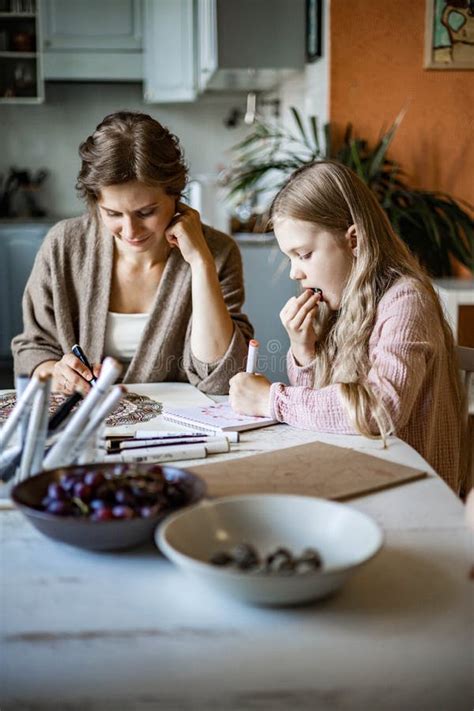 Young Beautiful Mother And Cute Daughter Draw A Mandala Pattern Together Artistic Markers And