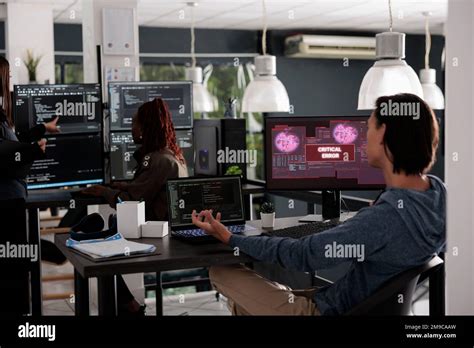 Asian App Developer Having Web Server Hacked Dealing With Critical Error On Computer Display In