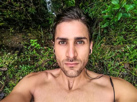 Premium Photo Portrait Of Shirtless Man In Grass