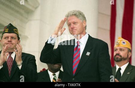 Former U S President Bill Clinton Salutes To Applauding Supports As He