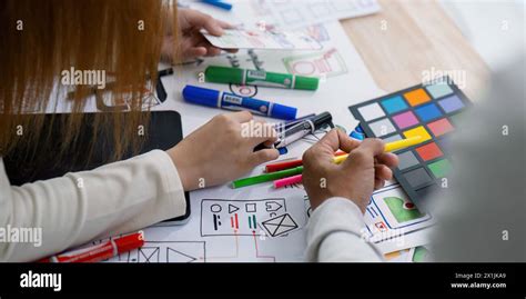 Team Of Ui Ux Web Designer Are Working Together To Develop Mobile