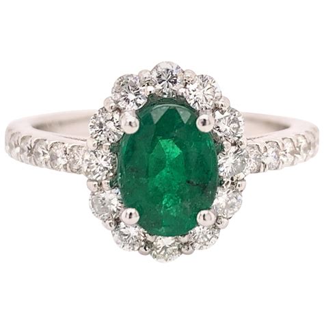 329 Carat Emerald Diamond Halo Princess Diana Engagement Ring For Sale