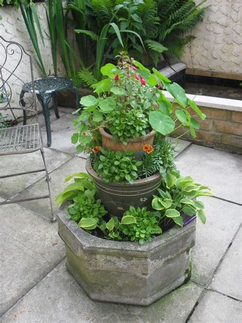 20 Stunning Tiered Planter Ideas To Elevate Your Garden Design
