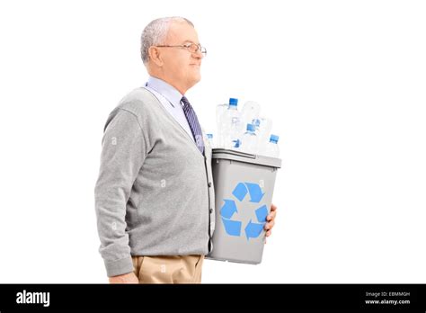 Senior Man Holding A Recycle Bin Isolated On White Background Stock Photo Alamy