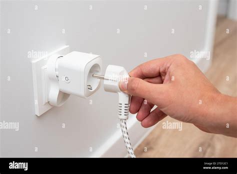 Using Wi Fi Smart Socket On The Wall In A Smart Home Controlling Electricity Consumption Stock