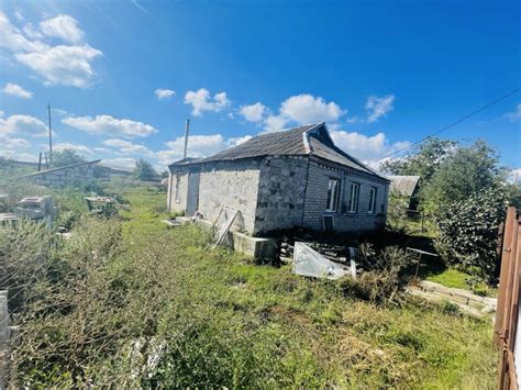 Домоволодіння Житловий будинок загальна площа 74 6 кв м з господарчими будівлями та