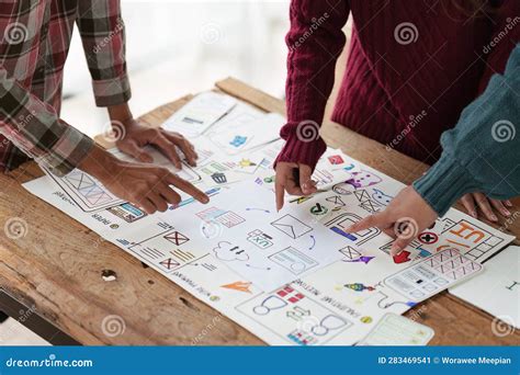 Close Up Ux Developer And Ui Designer Brainstorming Interface Wireframe Designcreative Digital
