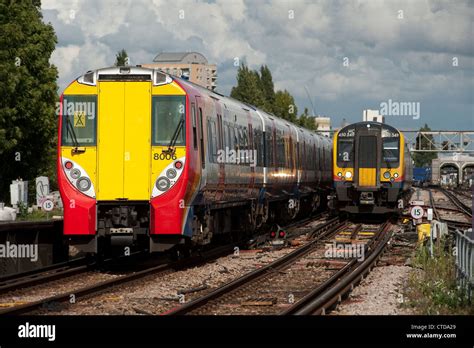 Class 458 Passenger Train In South West Trains Livery At Clapham
