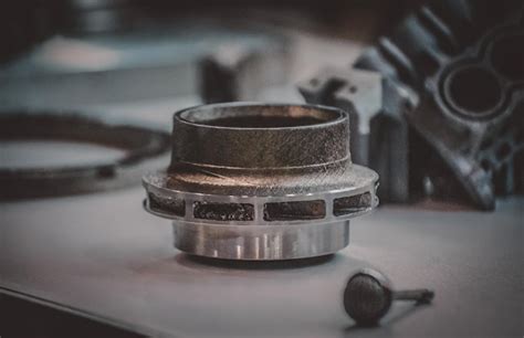 Premium Photo Man Is Holding Object Printed On Metal 3d Printer