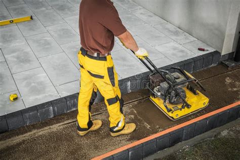 Vibrate Plate Ground Compactor Tamper In Action Stock Image Image Of