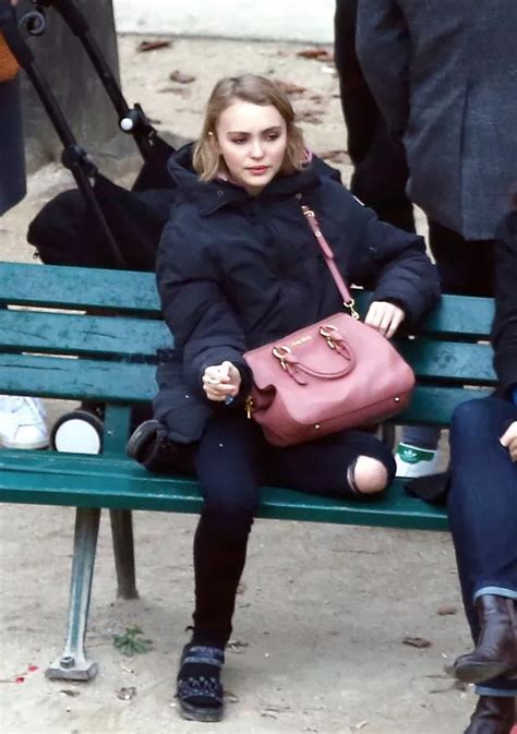 Lily Rose Depp Puffs Away On A Cigarette As She Rocks Parisian Chic In The French Capital