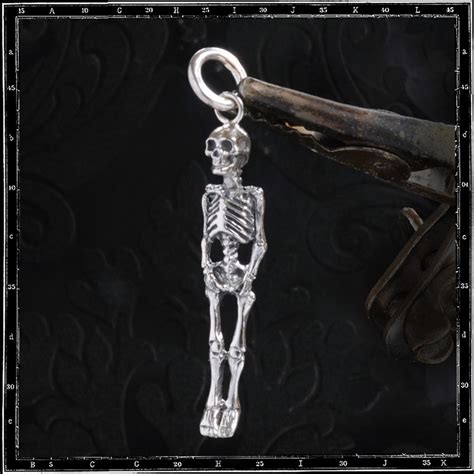 Tiny Skeleton Pendant