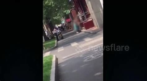 Two Men Take Off Clothes To Help A Woman Cover Her Naked Body Buy Sell Or Upload Video