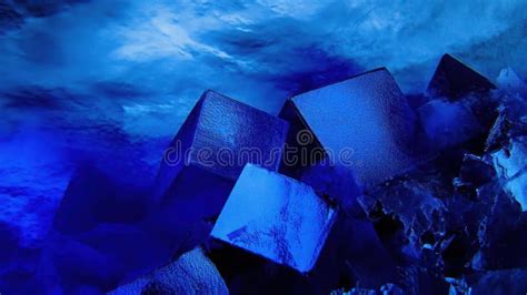 Abstract Image Of Blue Ice Cubes Partially Submerged Creating A Cool Serene Atmosphere Stock