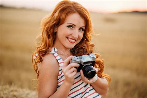 Beautiful Young Redhead Woman With Vintage Camera Stock Image Image