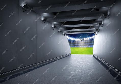 Premium Photo 3d Rendering Tunnel In Stadium With Green Football Field