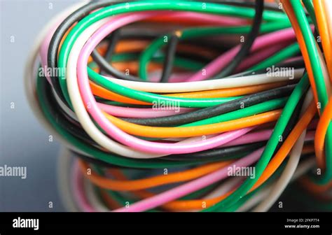 A Bundle Of Multicolored Electrical Car Computer Telephone Wires Twisted Together Background