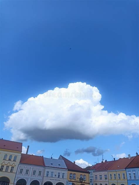 Colorful Buildings Under Wispy Clouds And Bright Blue Sky Stock Image Image Of Colorful Scene